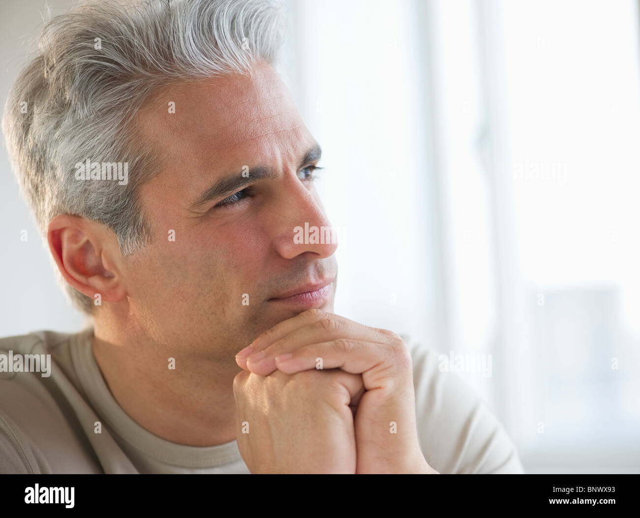 Portrait of a grey haired man Stock Photo - Alamy