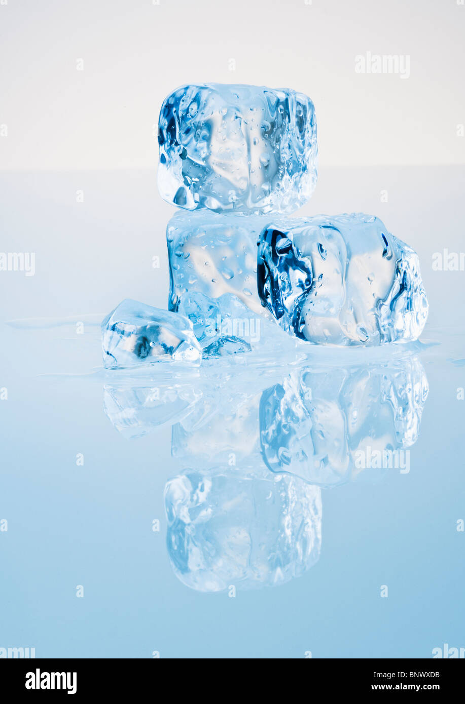 Cubes of melting ice Stock Photo - Alamy
