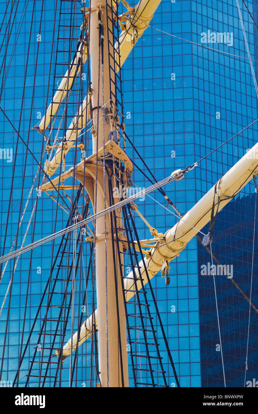Peking mast in front of high-rise building at South Street seaport ...