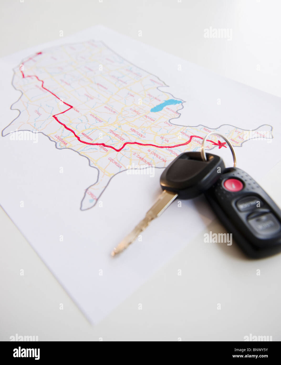 Car keys beside map of planned road trip Stock Photo - Alamy