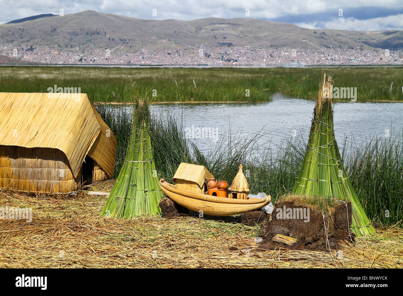Uros people living on the floating islands of the Lake Titicaca in Peru ...