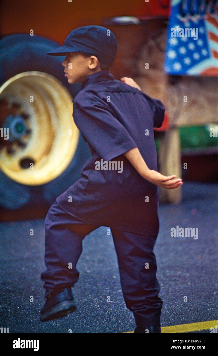 Young boy step marching Stock Photo - Alamy