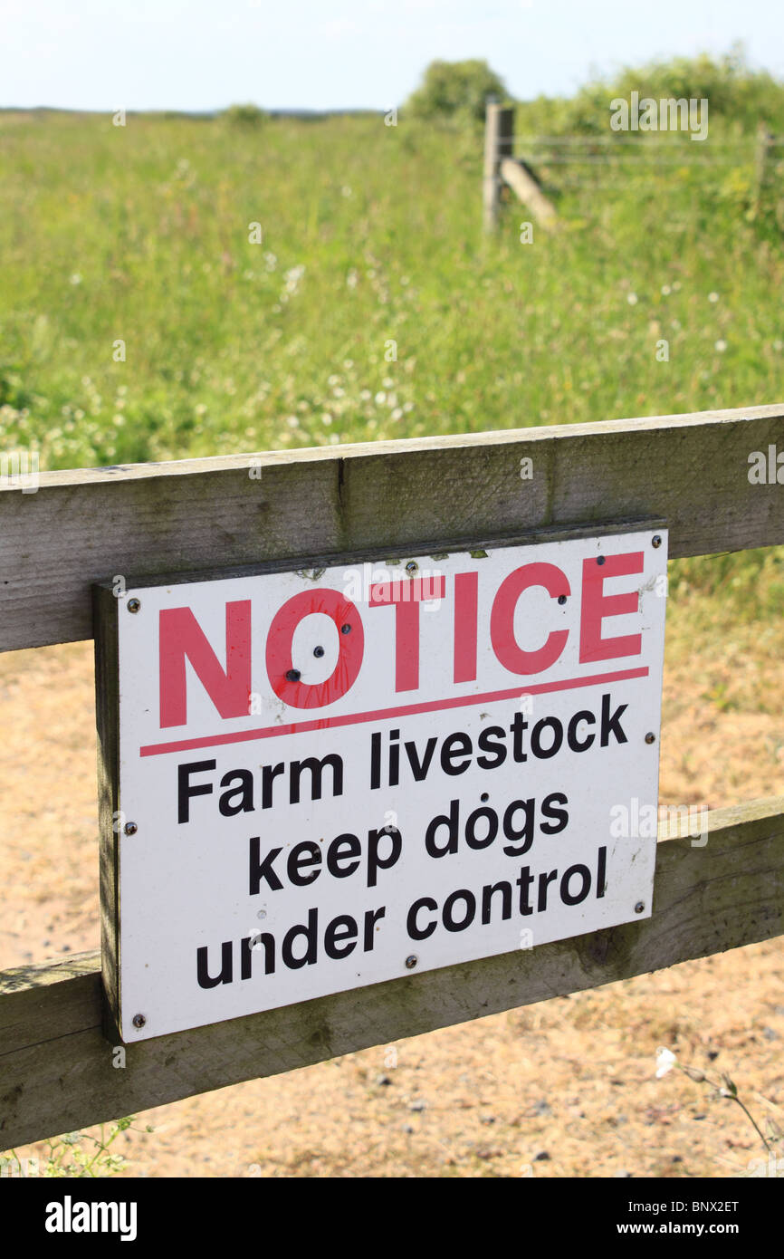 Warning sign directing dog owners to keep dogs under control, In ...