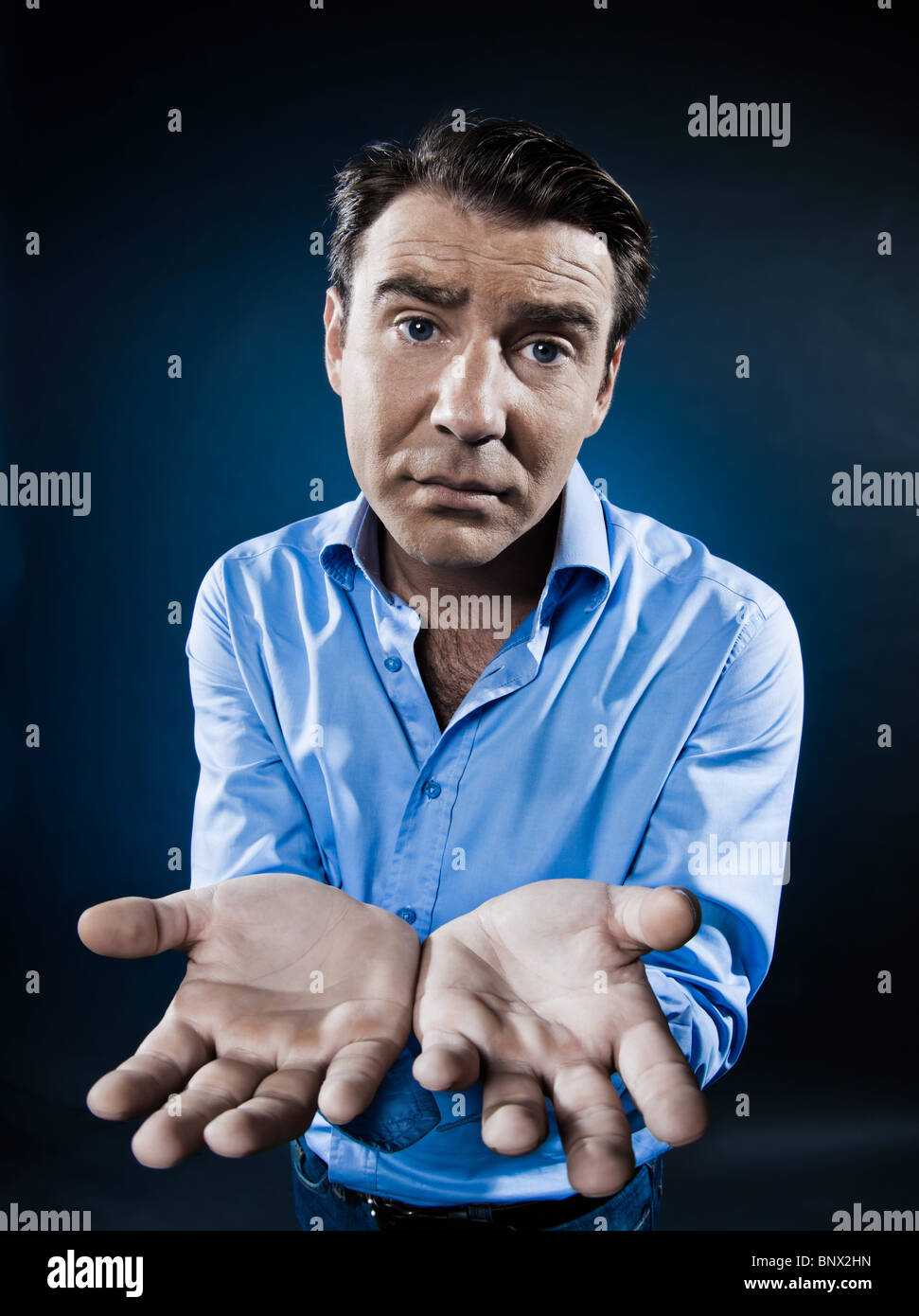 caucasian man begging despair portrait isolated studio on black ...