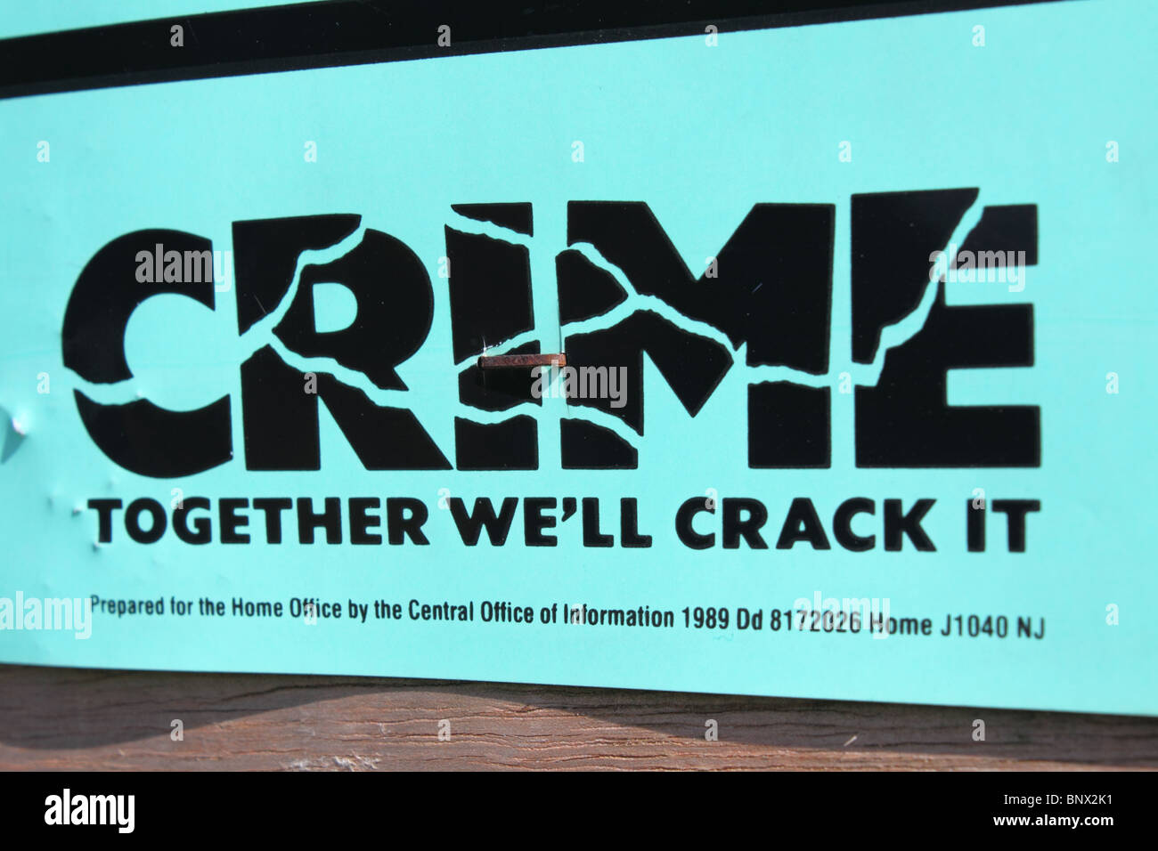 "Crime : together we'll crack it" poster Stock Photo - Alamy