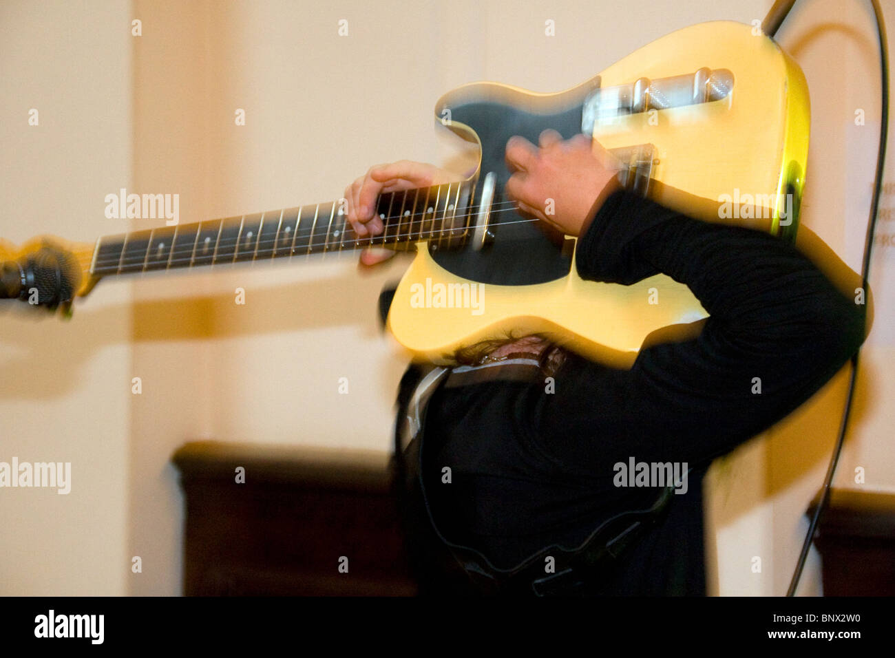 Lee Wharton of After Hours Blues Band playing the guitar behind his ...