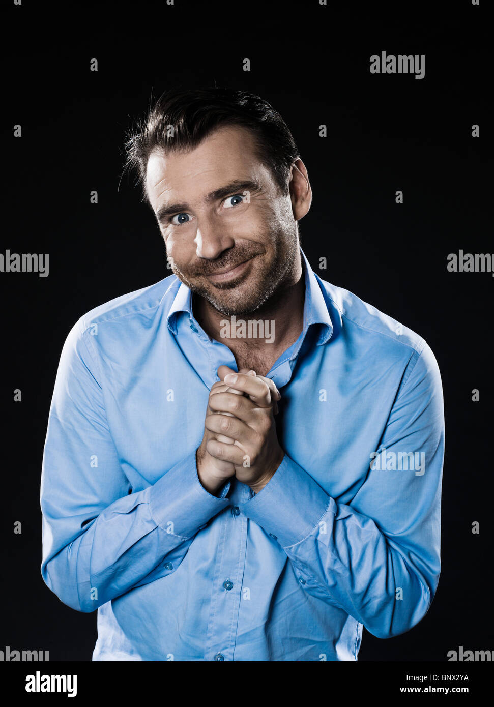 caucasian man unshaven pray mischievous portrait isolated studio on ...