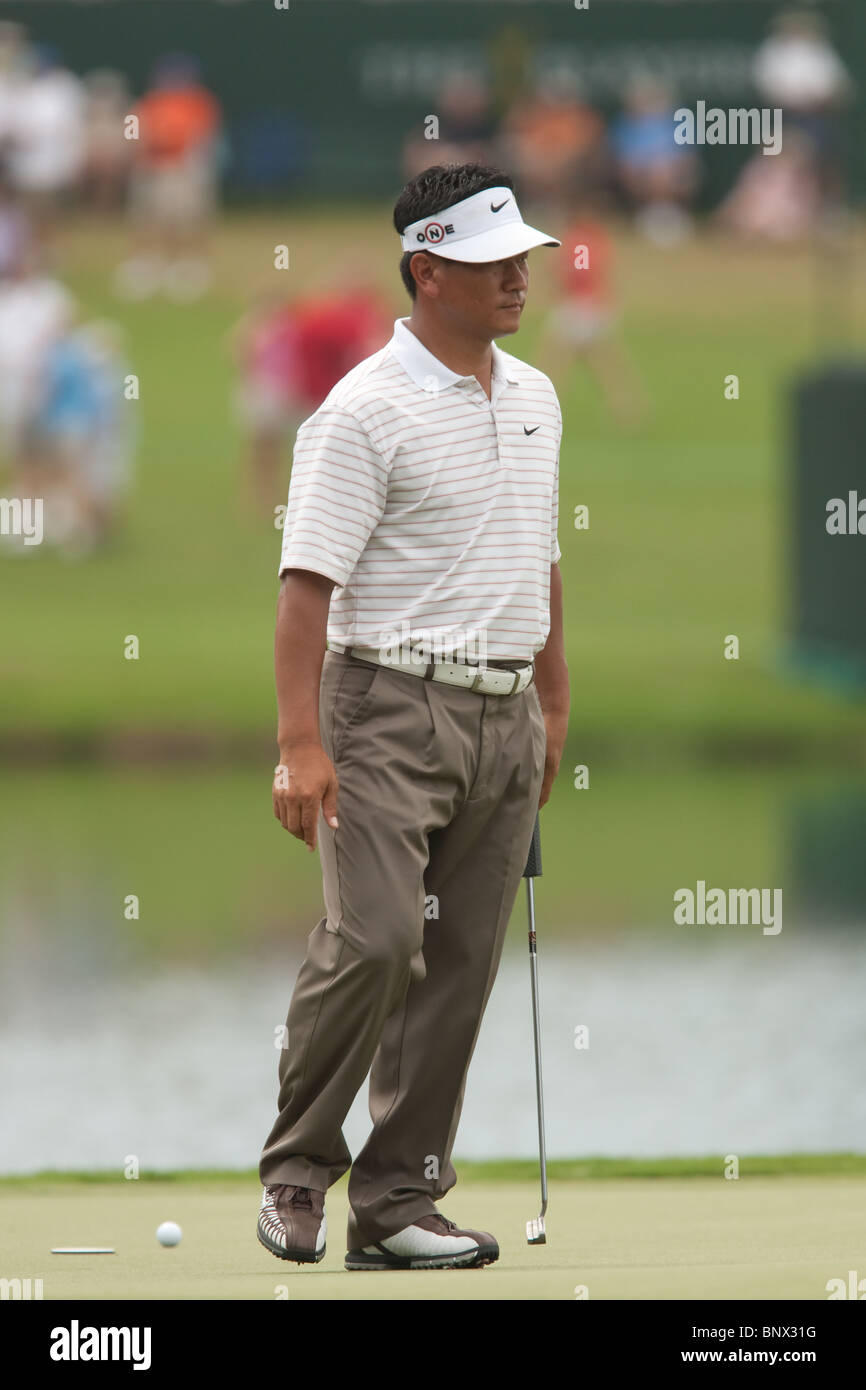 K.J. Choi works on his putting on the 17th green during a practice ...