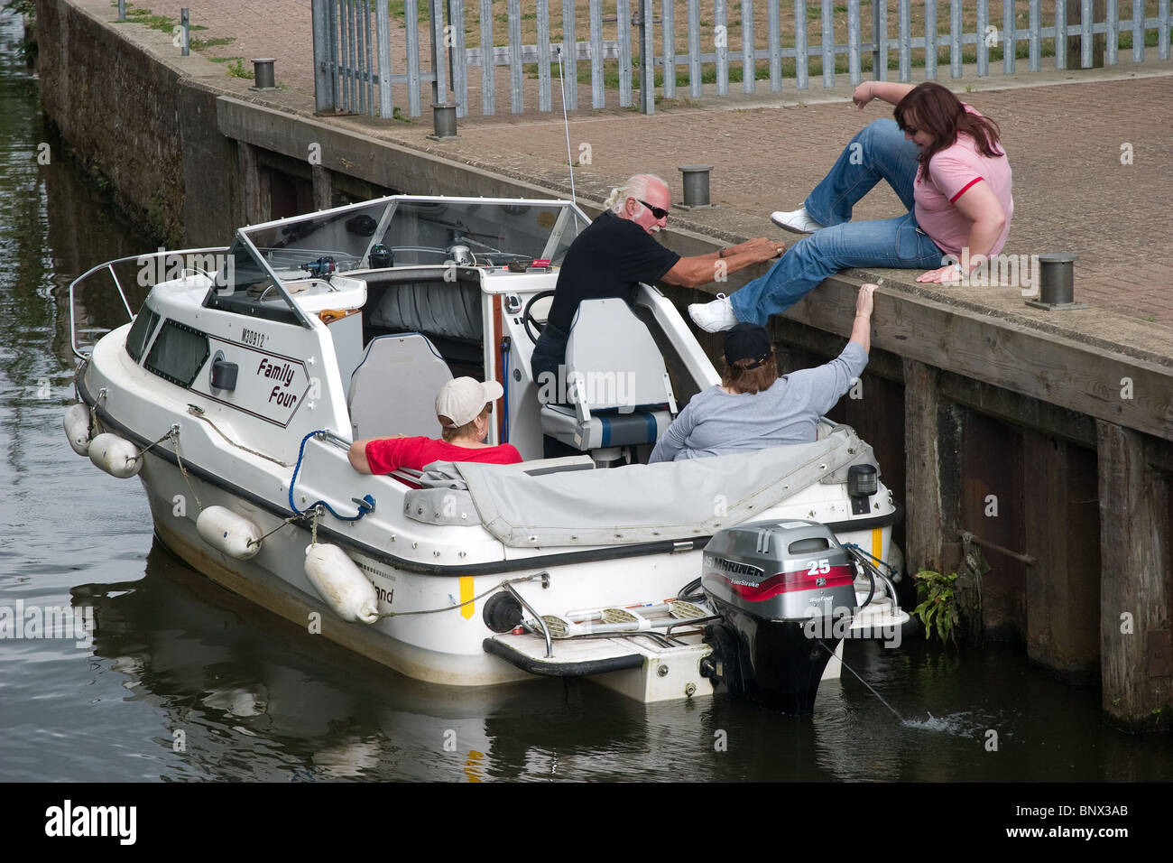 moored mooring boating cruiser pleasure boat craft Stock Photo - Alamy