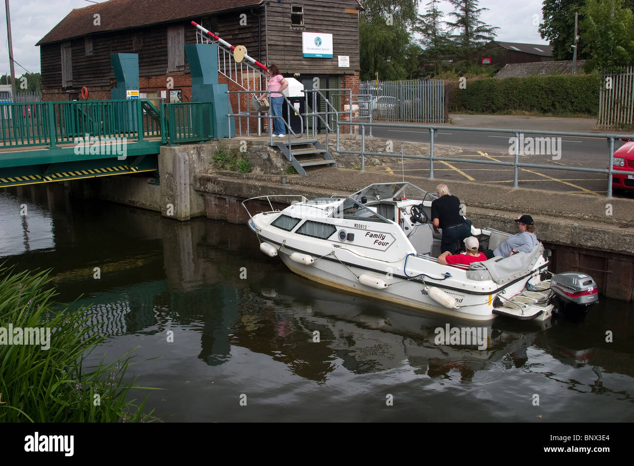 Large leisure boat Bascule lifting bridge boating Stock Photo - Alamy