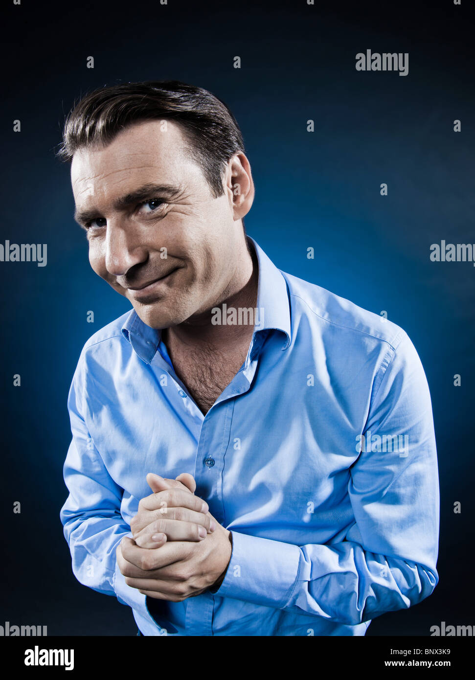 caucasian man portrait sneaky isolated studio on black background Stock ...