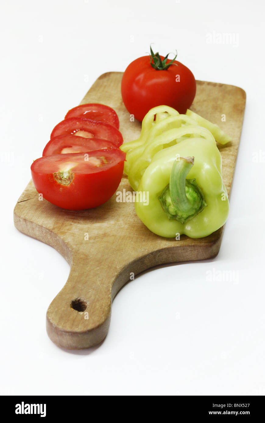 Tomatoes peppers on table Cut Out Stock Images & Pictures - Alamy