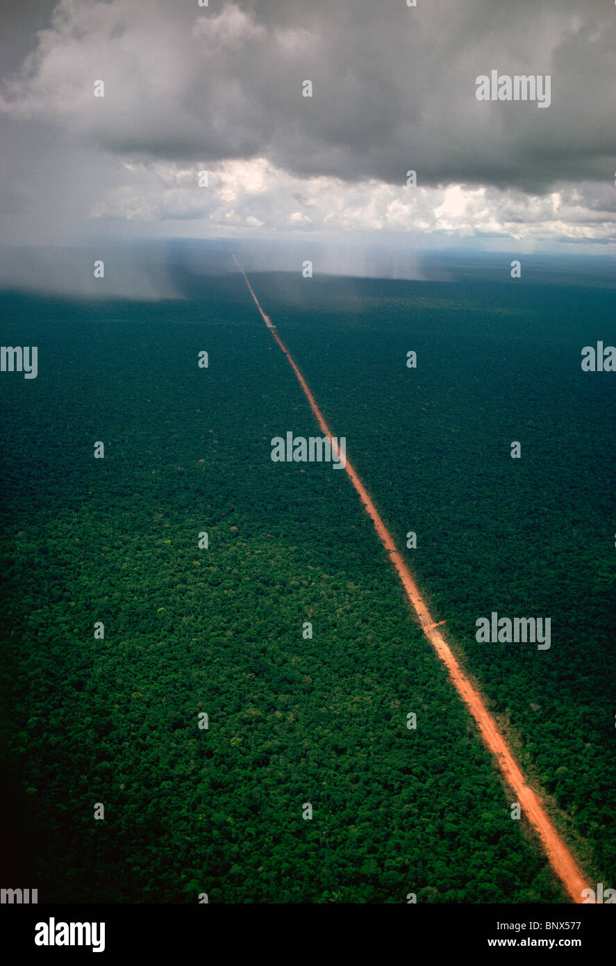 An unpaved highway cuts through the Brazilian Amazon rainforest Stock ...