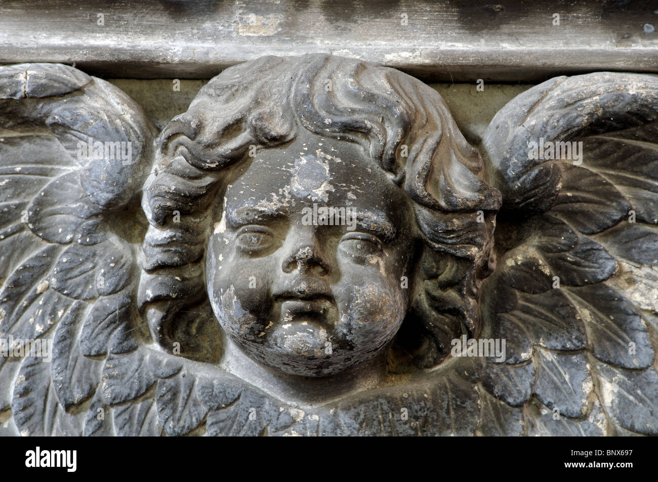 Cherub on memorial in St. Lawrence`s Church, Mickleton, Gloucestershire ...
