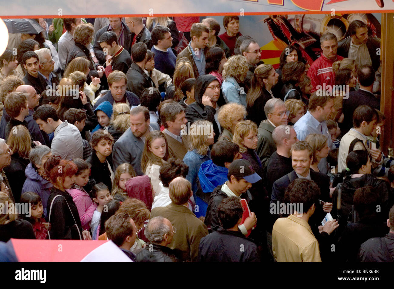 Large crowd waiting to get into a theater on 42nd Street Stock Photo ...
