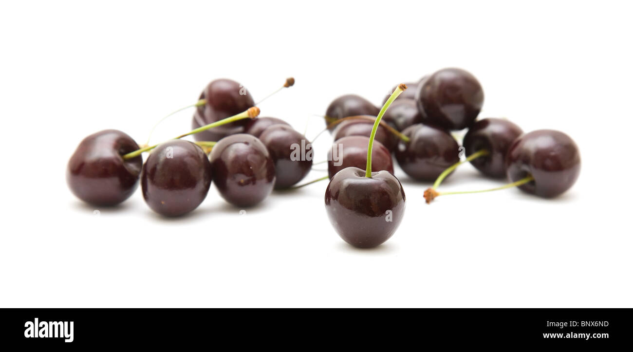 handful of dark cherries isolated on white background Stock Photo - Alamy