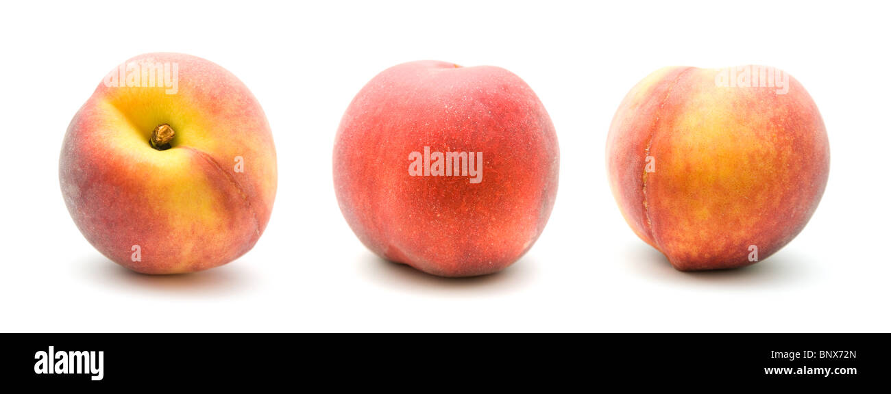 three ripe red peaches isolated on white background Stock Photo - Alamy