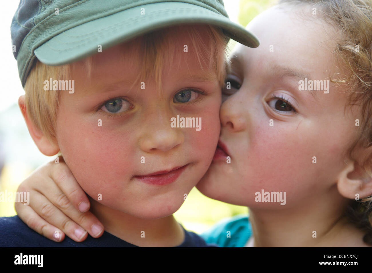 Little Girl Kissing A Boy Stock Photo Getty Images