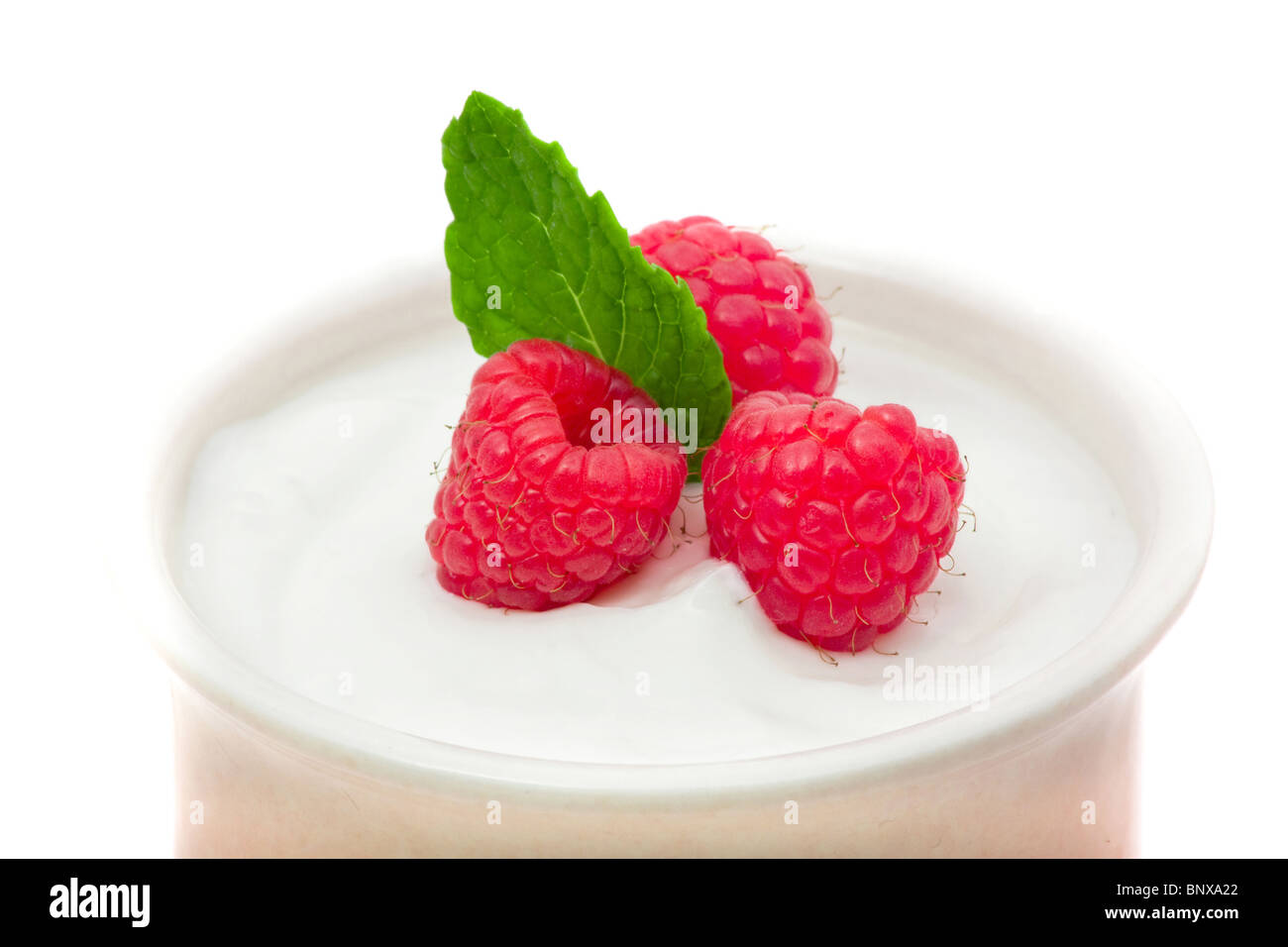 Raspberries and yogurt Stock Photo - Alamy