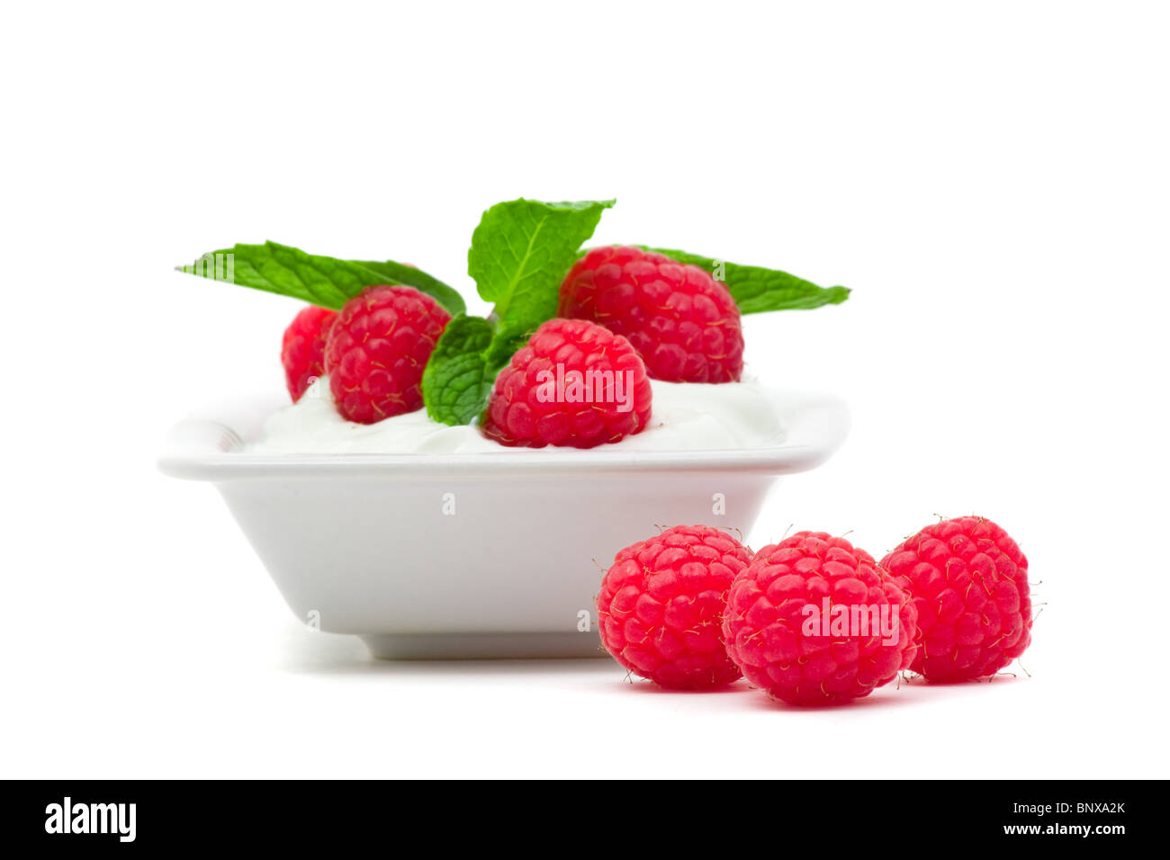 Raspberries and yogurt Stock Photo - Alamy