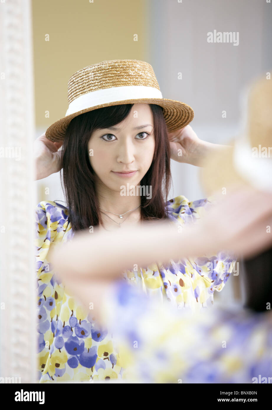 Young woman getting ready Stock Photo - Alamy