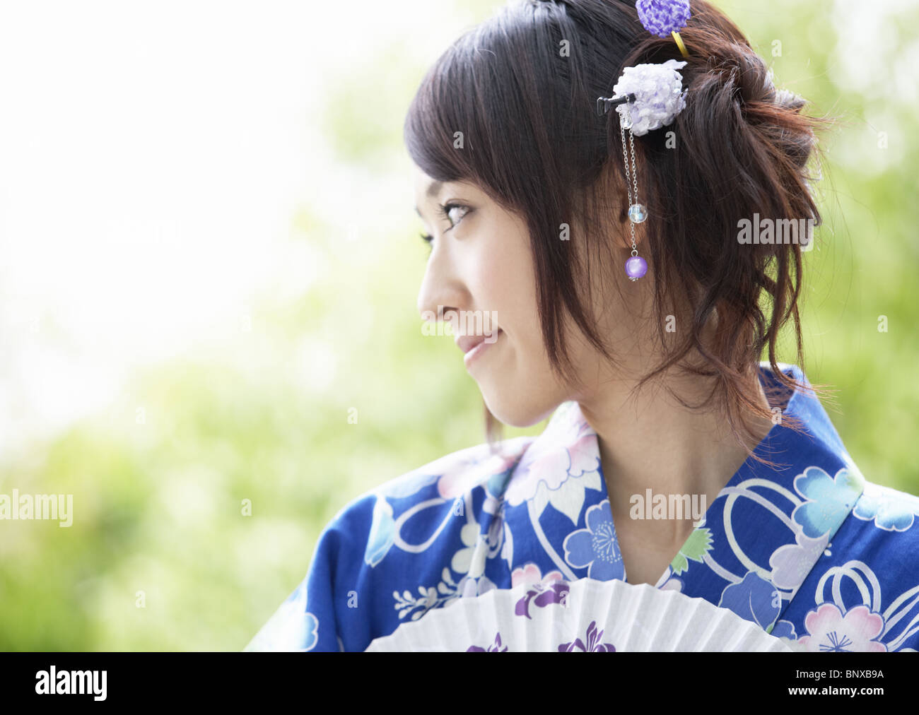 Upper body profile young woman hi-res stock photography and images - Alamy