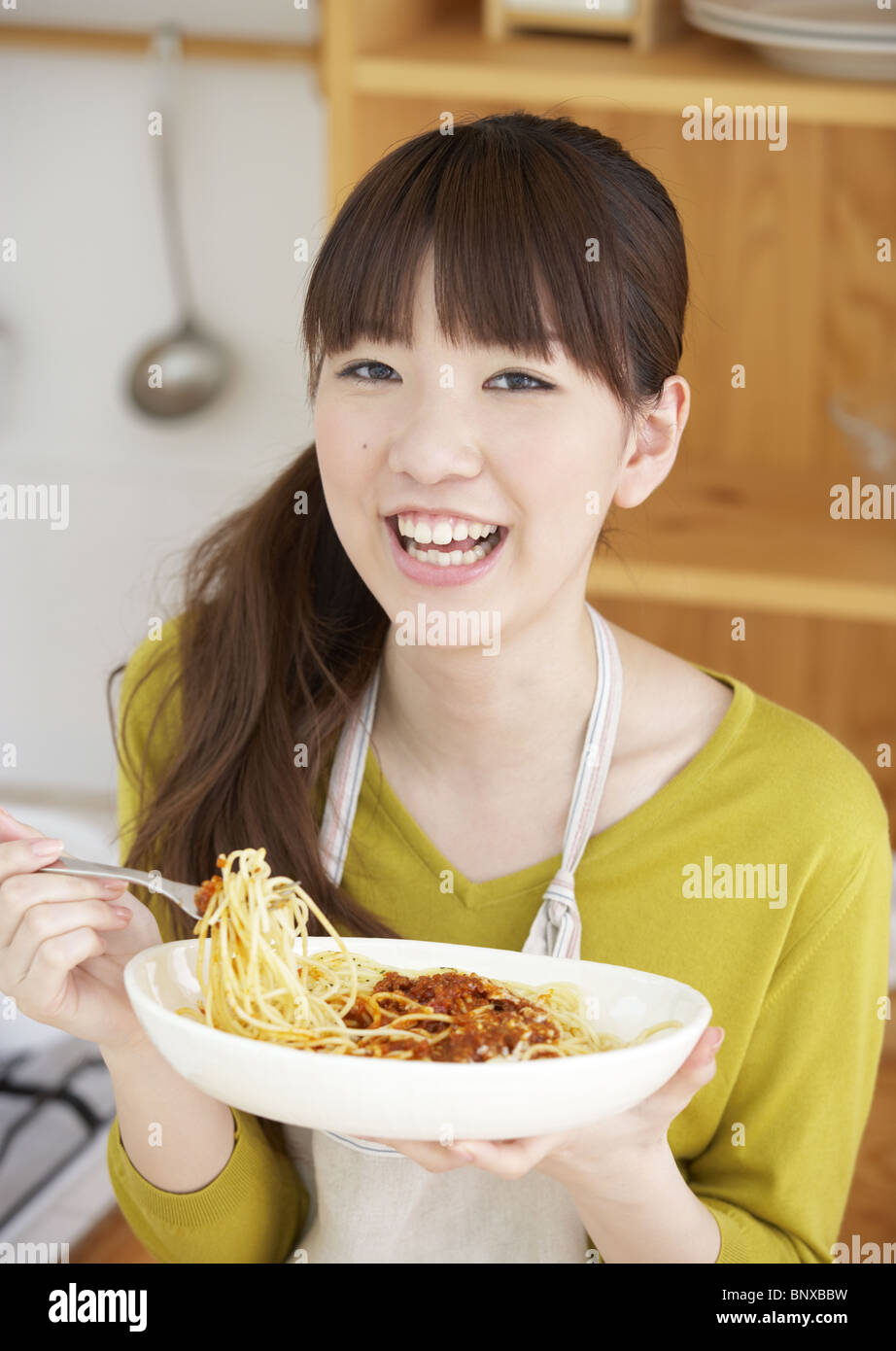 Woman eating pasta japanese hi-res stock photography and images - Alamy