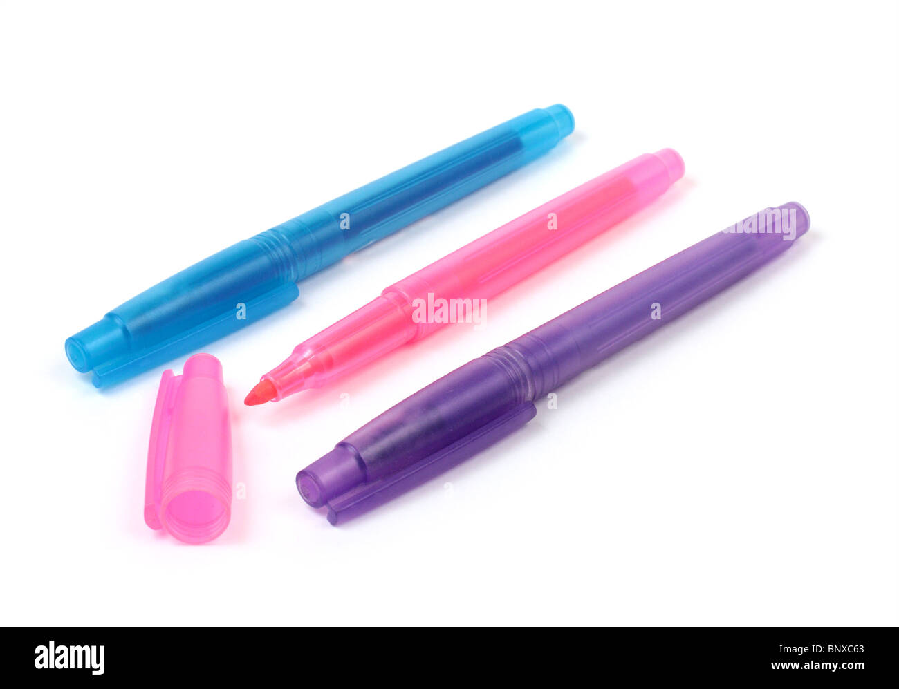 Colored markers isolated on a white background Stock Photo - Alamy