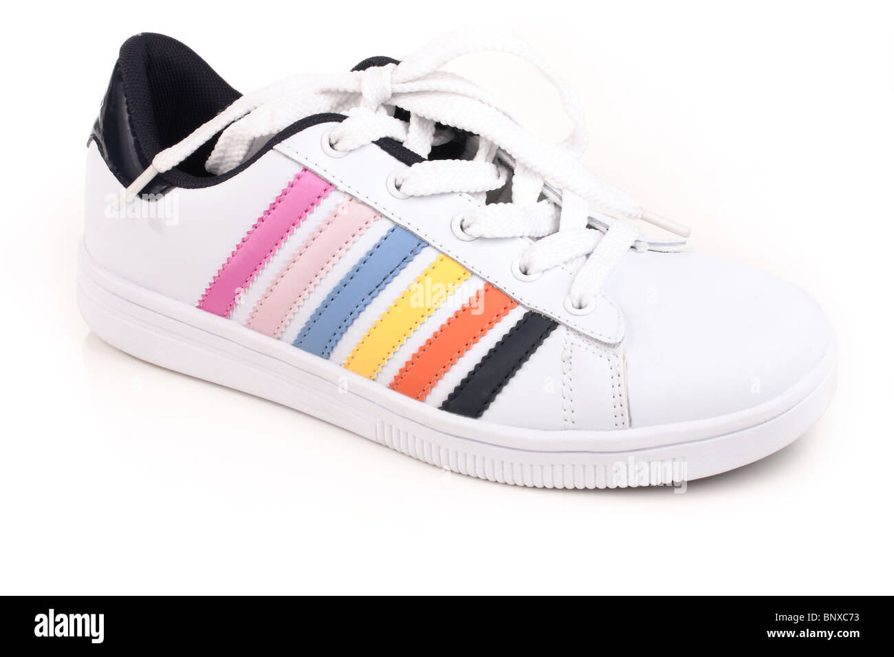 Athletic shoes with colorful stripes on a light background Stock Photo ...