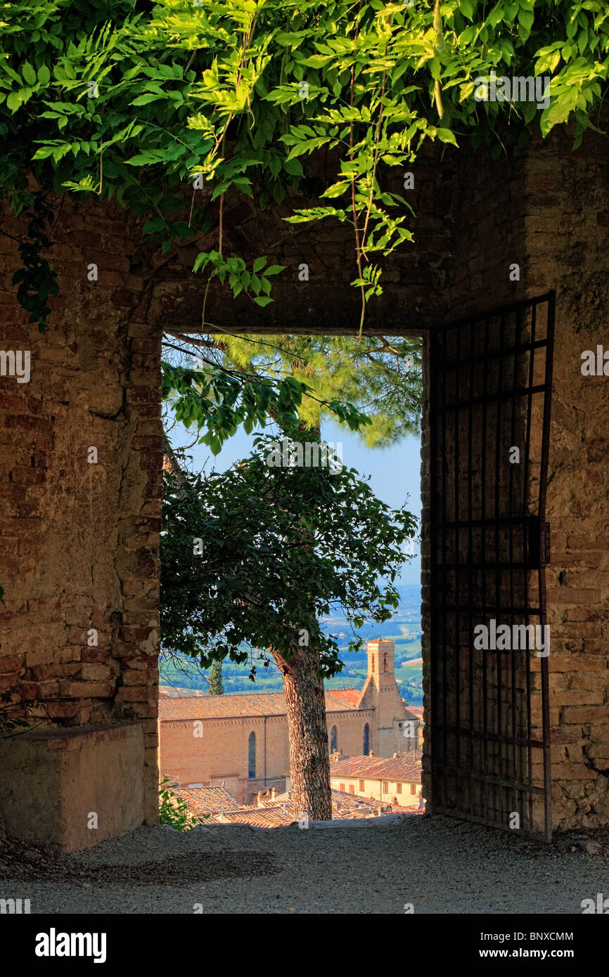 Open gate in La Rocca (fortress) in Tuscany's San Gmignano reveals the ...