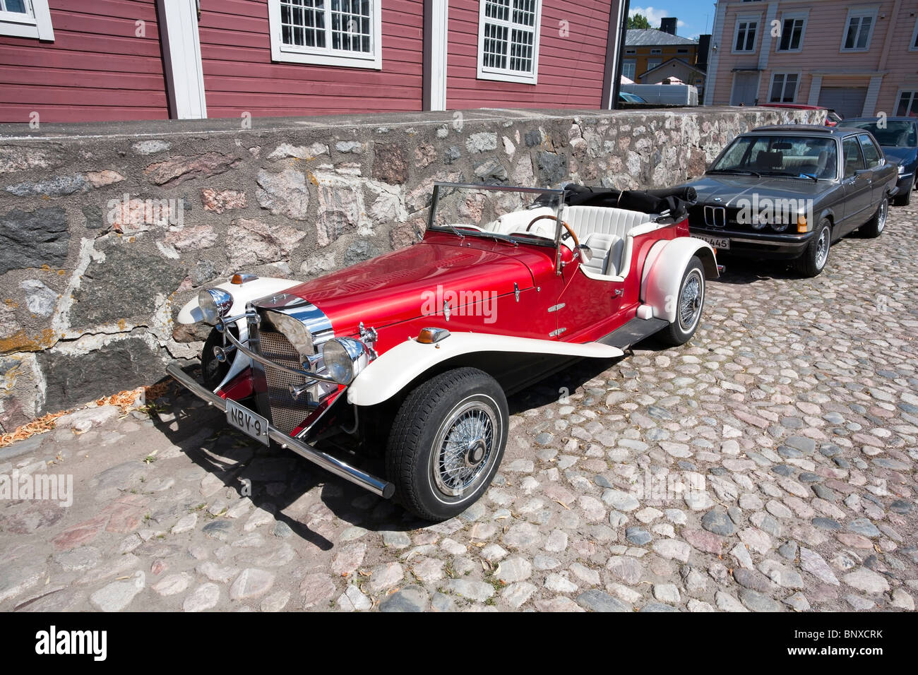 Red small car hi-res stock photography and images - Alamy