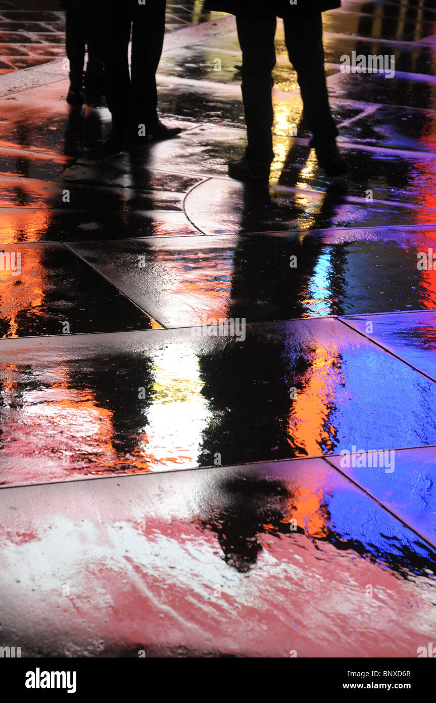 Reflections Of Neon Lights On The Pavement After Rain In Piccadilly ...