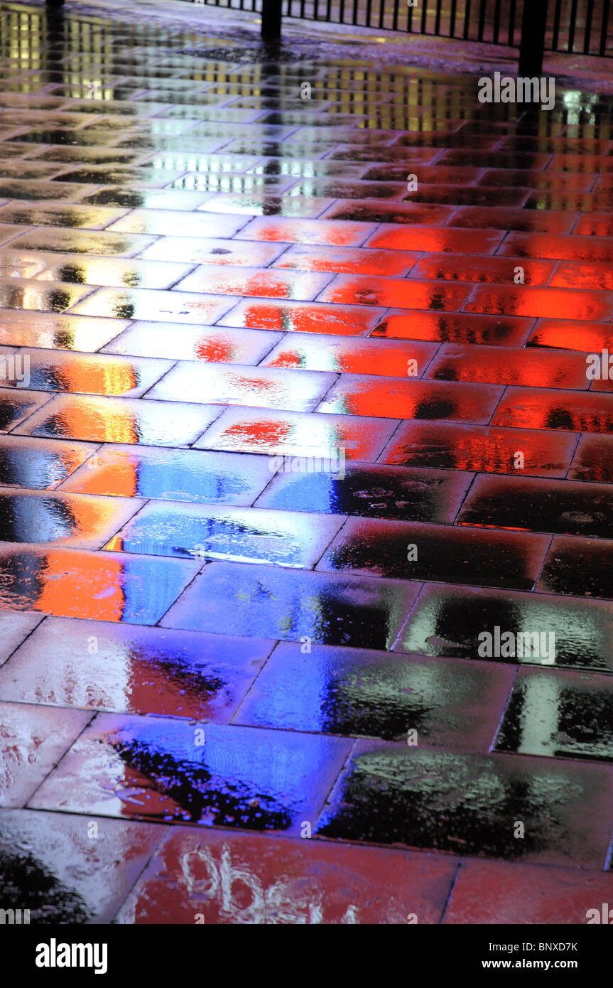 Reflections Of Neon Lights On The Pavement After Rain In Piccadilly ...