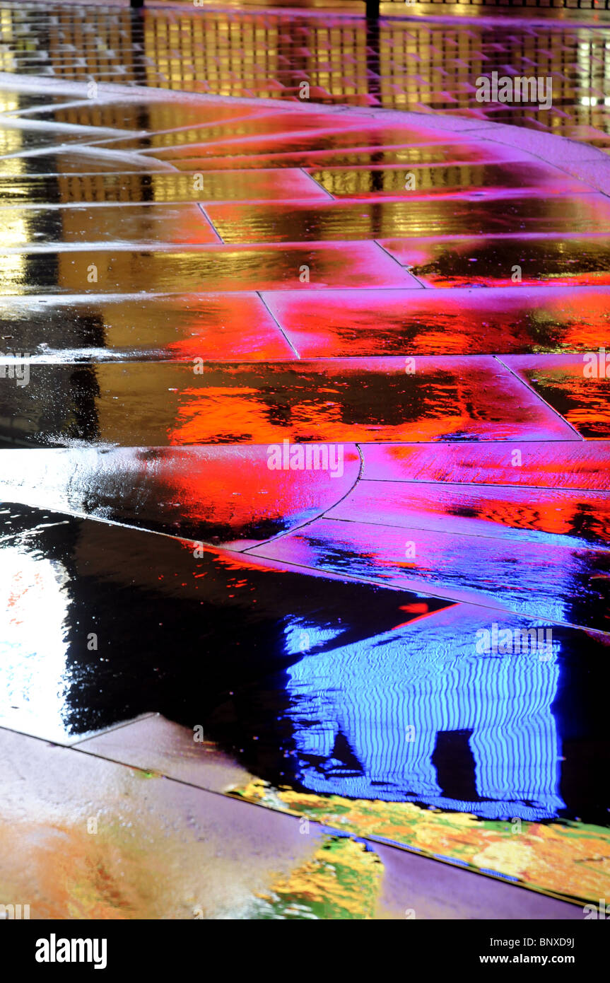 Reflections Of Neon Lights On The Pavement After Rain In Piccadilly ...
