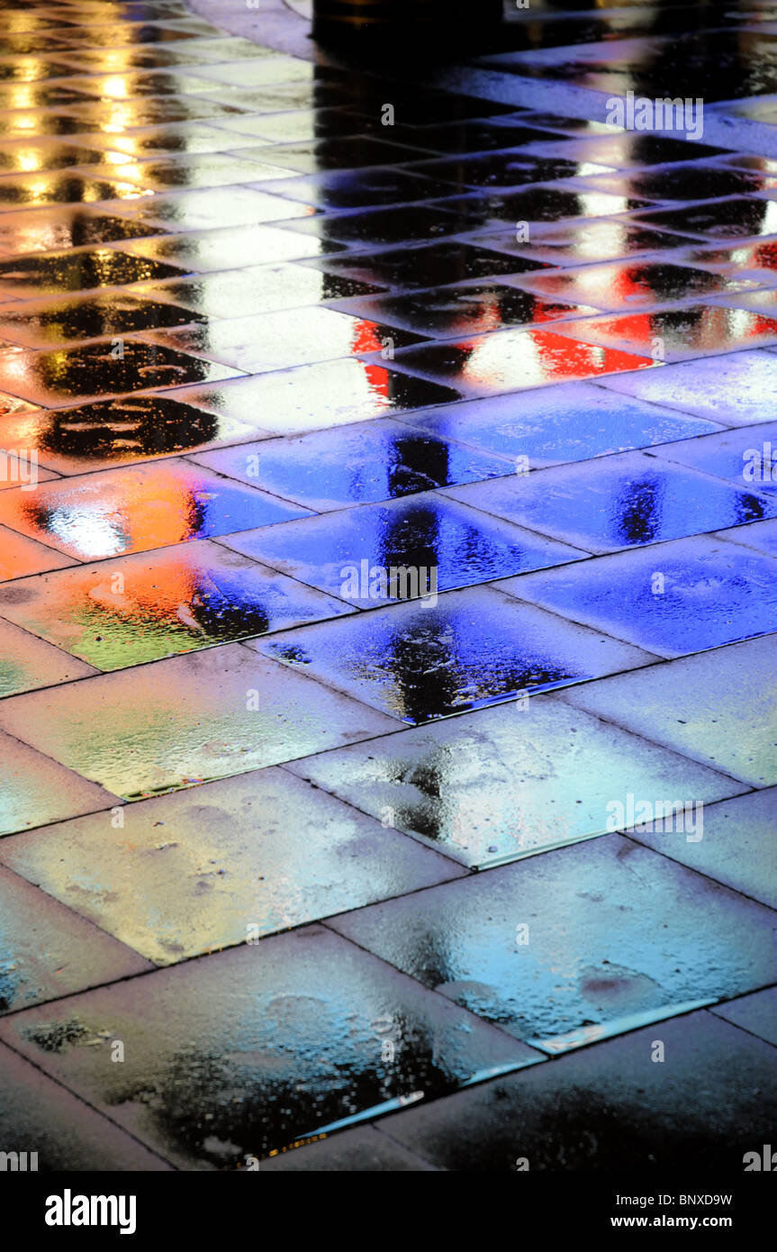 Reflections Of Neon Lights On The Pavement After Rain In Piccadilly ...