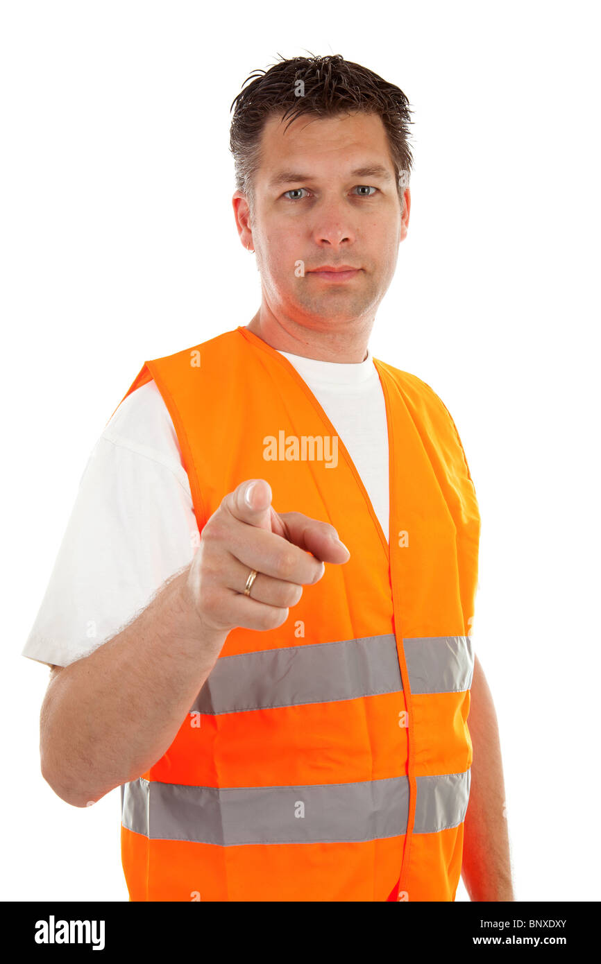man in safety vest over white background is pointing at you Stock Photo ...