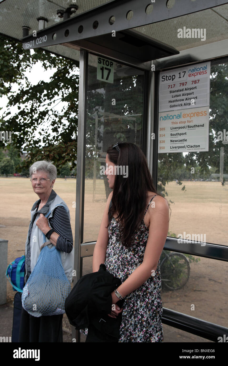 Waiting for a bus Stock Photo - Alamy