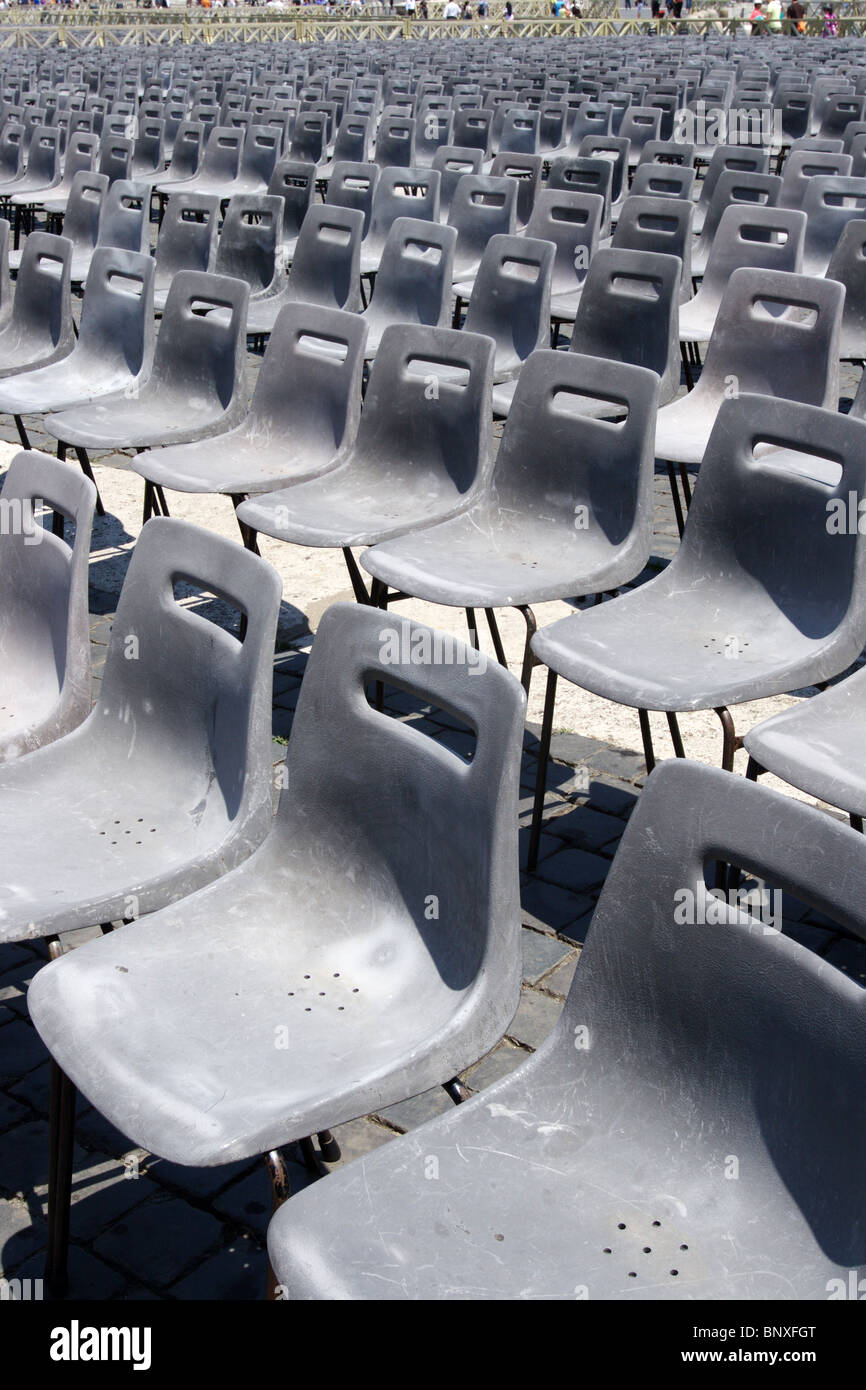 plastic chairs ordered St.Peter Rome Vatican group Stock Photo - Alamy