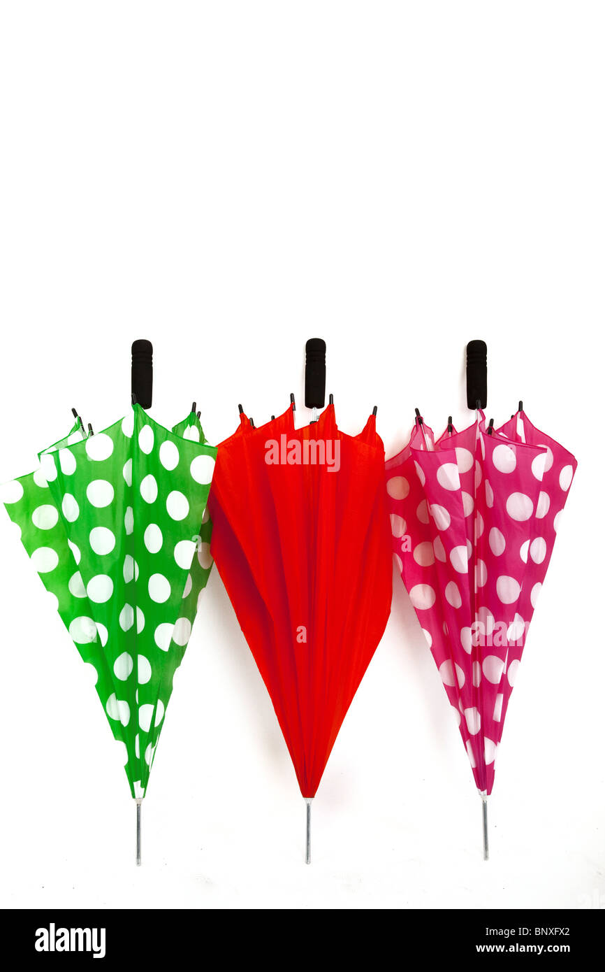 An umbrella for three hi-res stock photography and images - Alamy