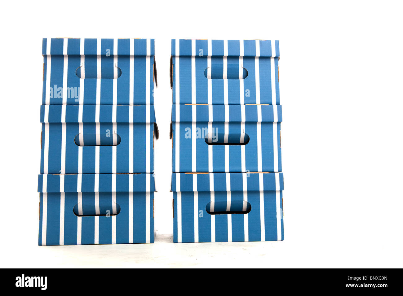 Two Piles of Colourful Cardboard Boxes on White Isolated Background ...