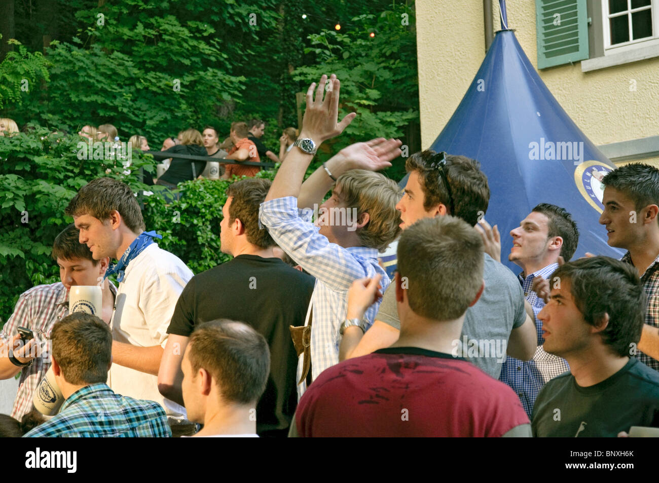 Young men celebrating at the 2010 "Bergfest" worlds oldest beer ...