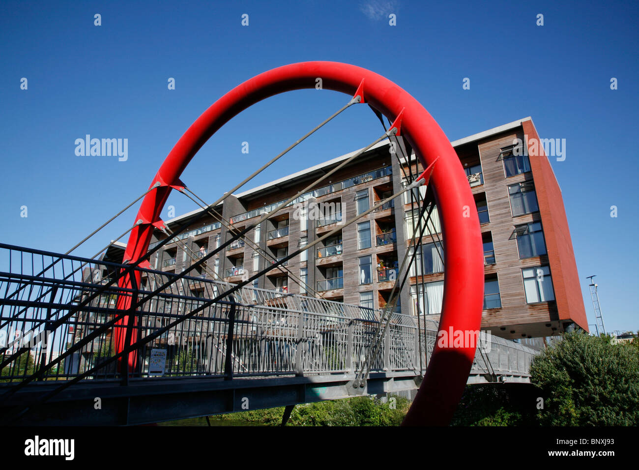 Looking across Hertford Union Canal footbridge to the Omega Works ...