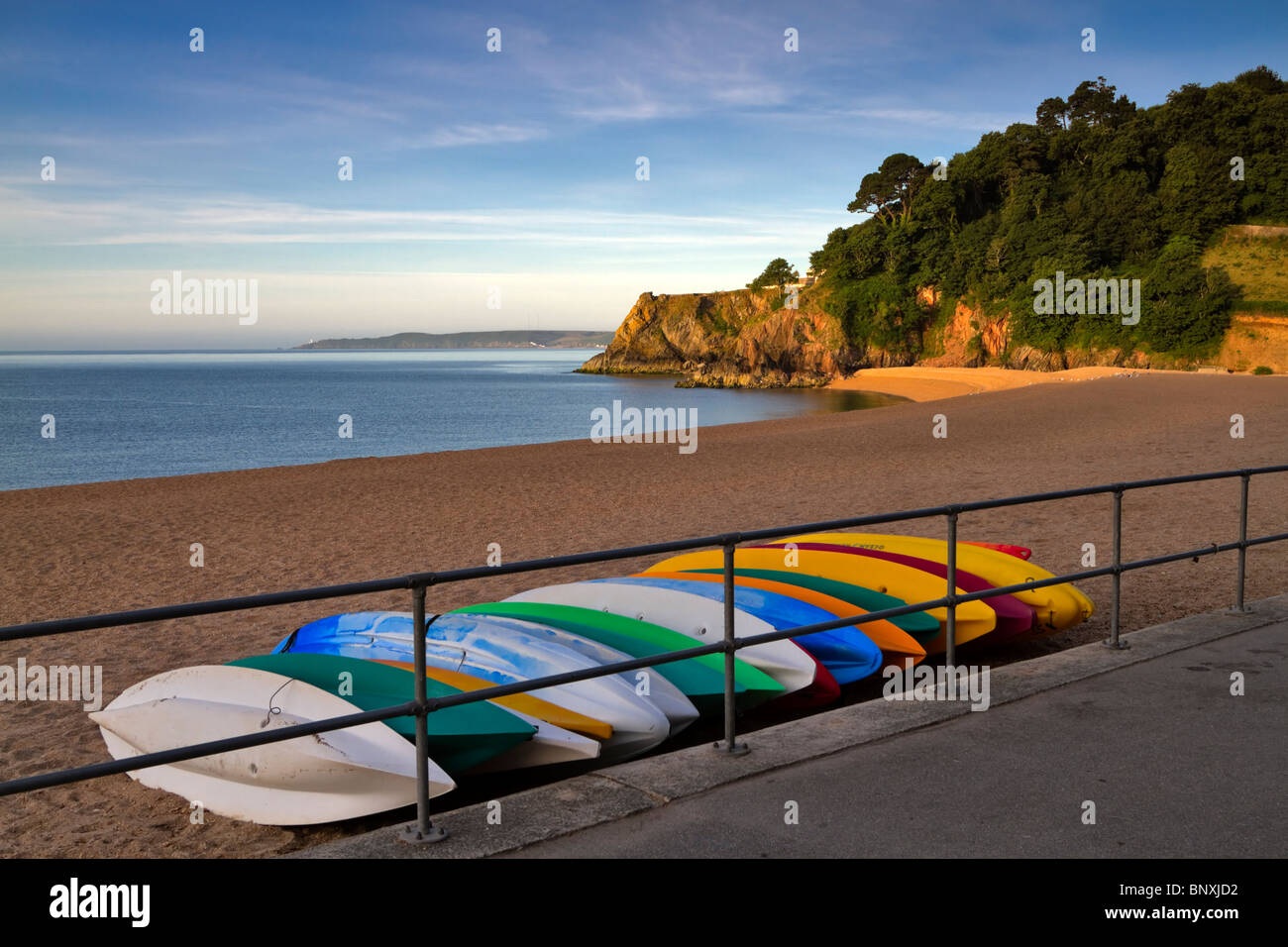 Blackpool Sands, South Hams, Devon. A private beach with stacked kayaks ...