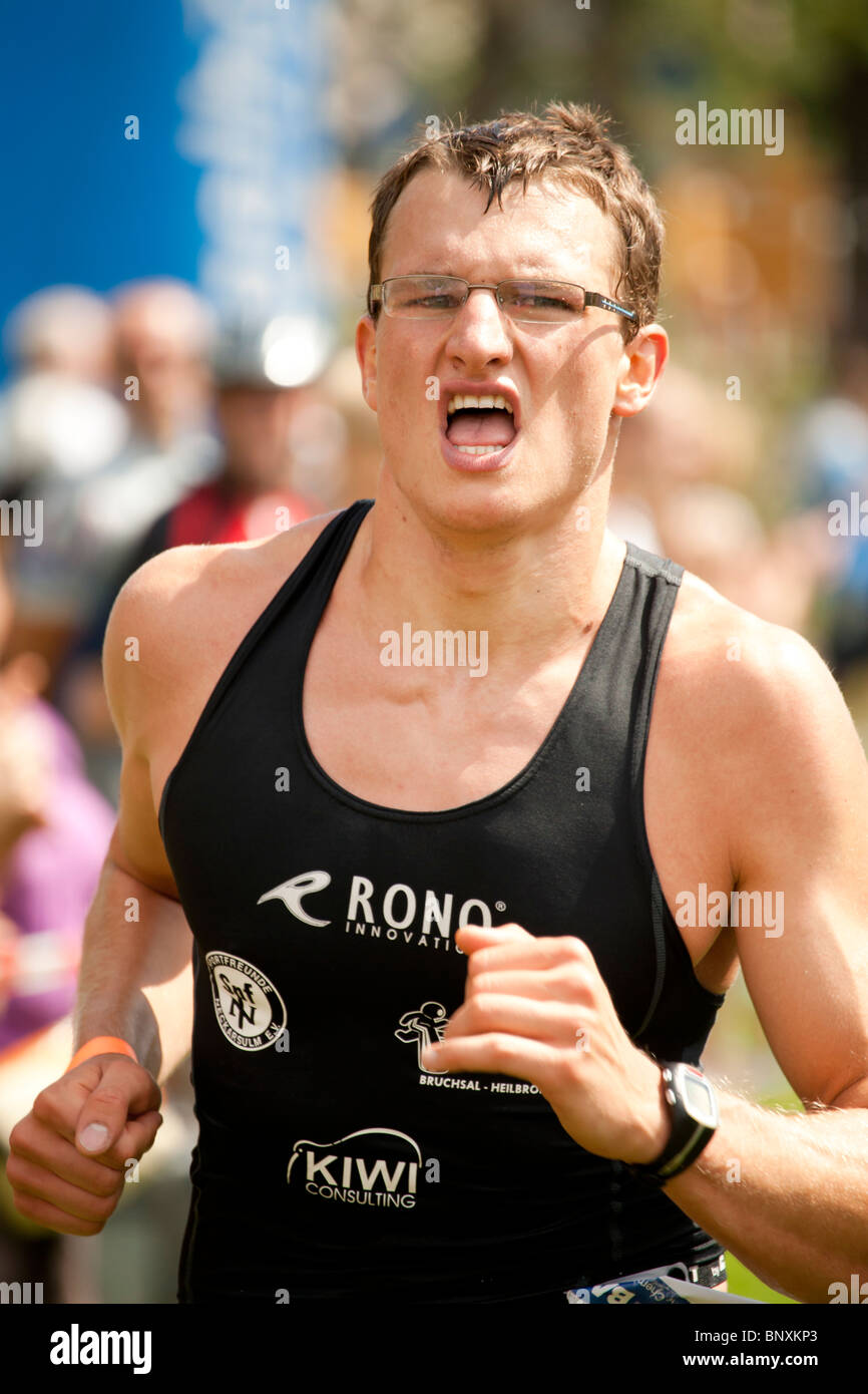 HEIDELBERG - AUGUST 1. Runner at Heidelberg Triathlon competition ...