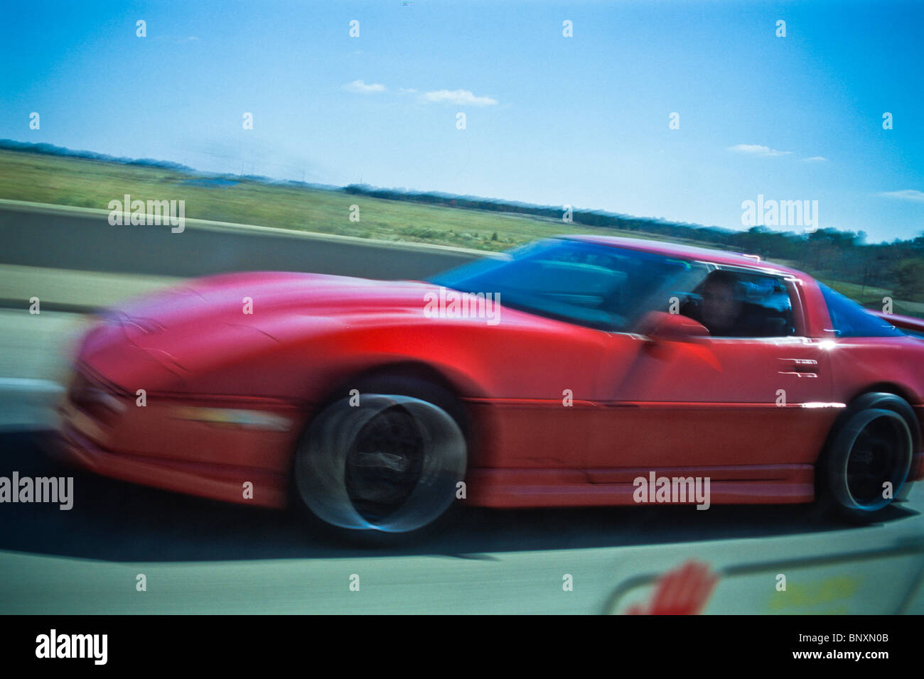 Car moves along highway Stock Photo - Alamy