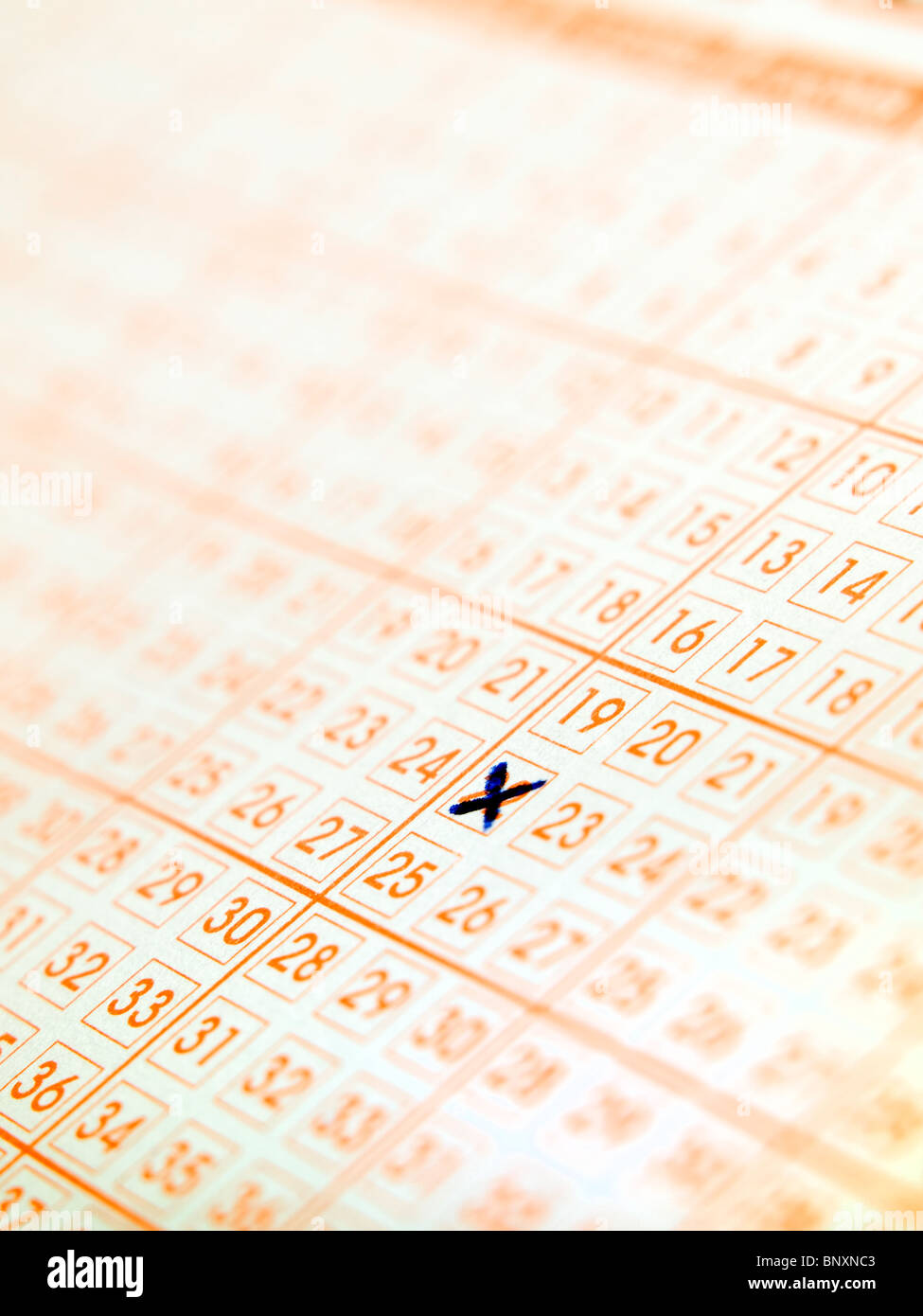 Closeup of lottery ticket with a marked number Stock Photo - Alamy