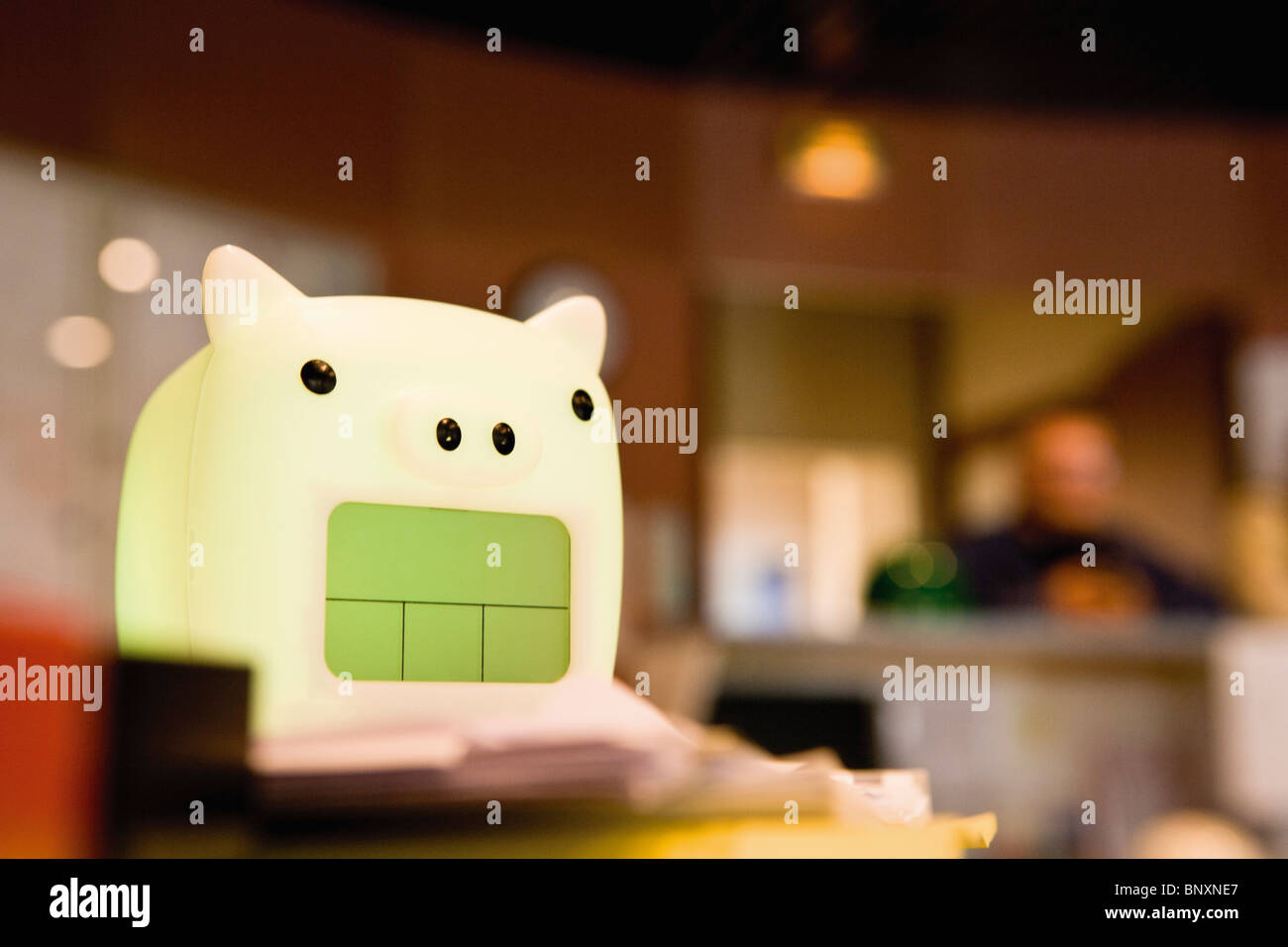 Glowing pig shape with digital display Stock Photo - Alamy