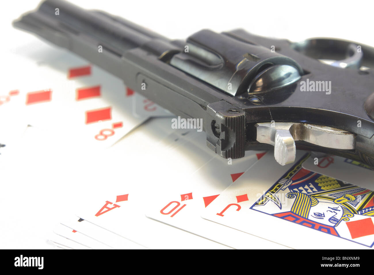 gun and playing cards Stock Photo - Alamy