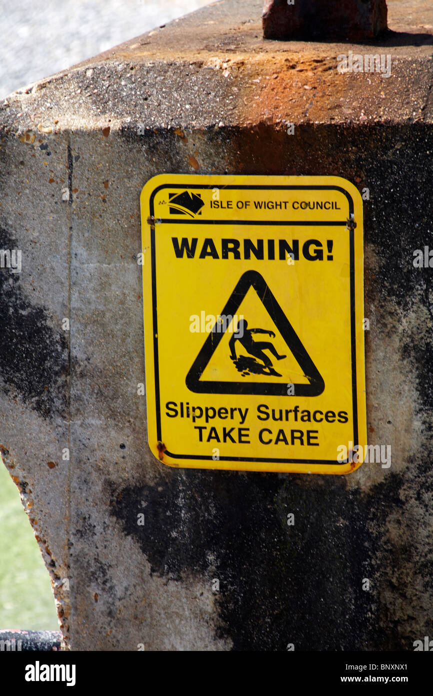 Slippery surfaces take care sign hi-res stock photography and images ...