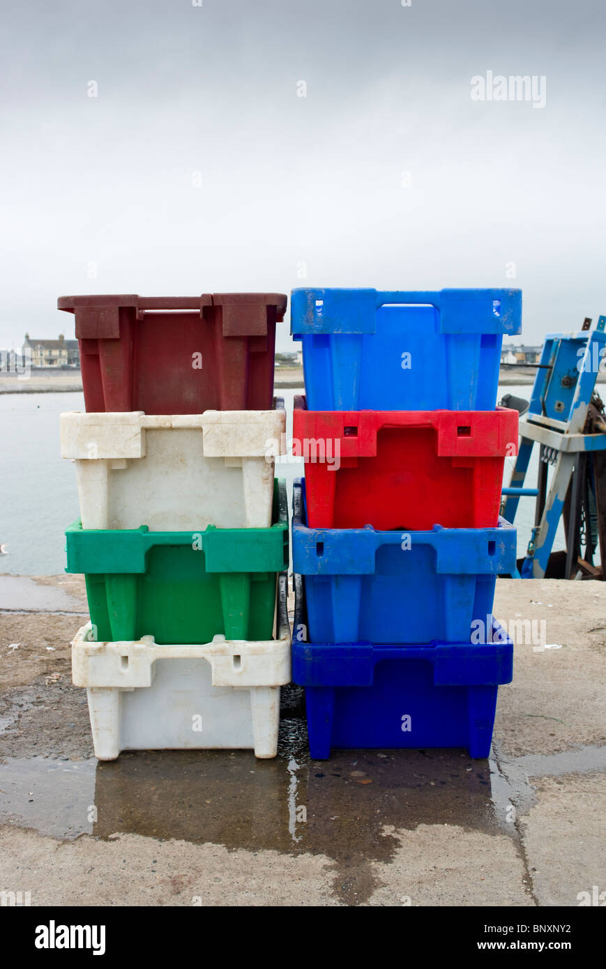 Colourful fish boxes on quayside hi-res stock photography and images ...